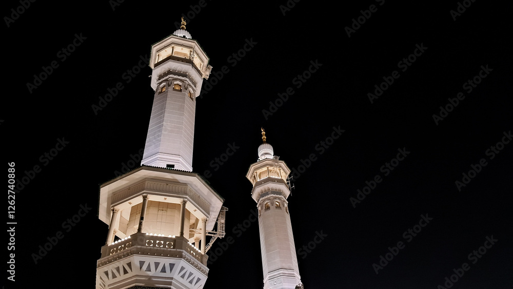Poster Ramadan background with the minarets and lightings of Al-Haram ...