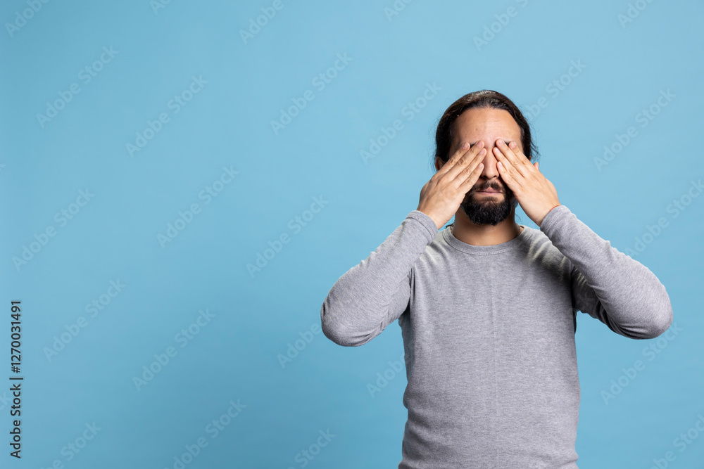 Poster Young adult showing the three wise monkeys symbol with hands ...