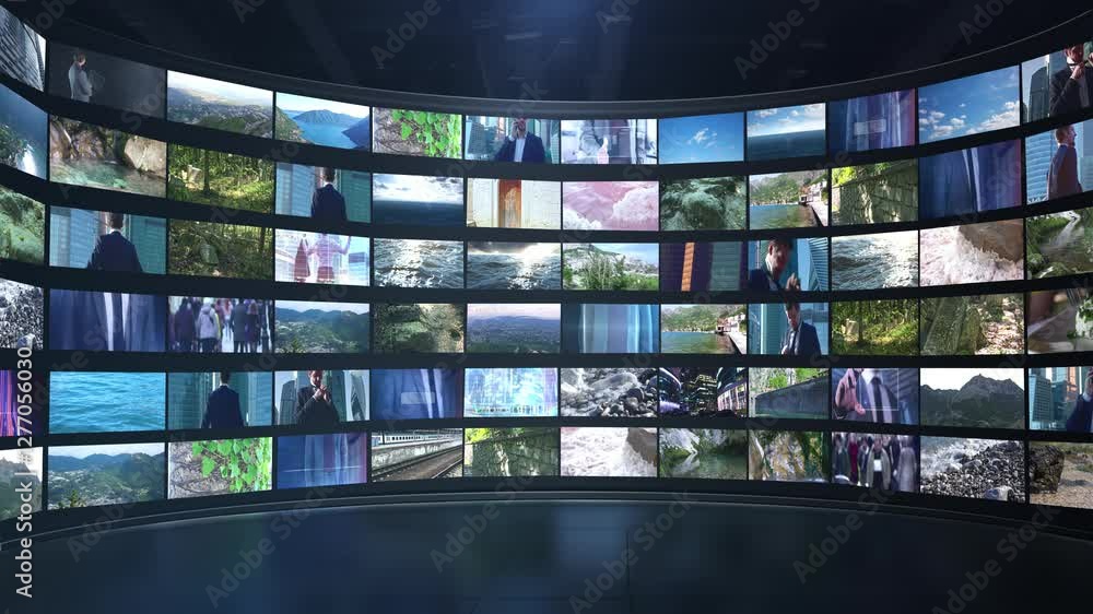 Big curved video wall showing multiple footage clips with question ...