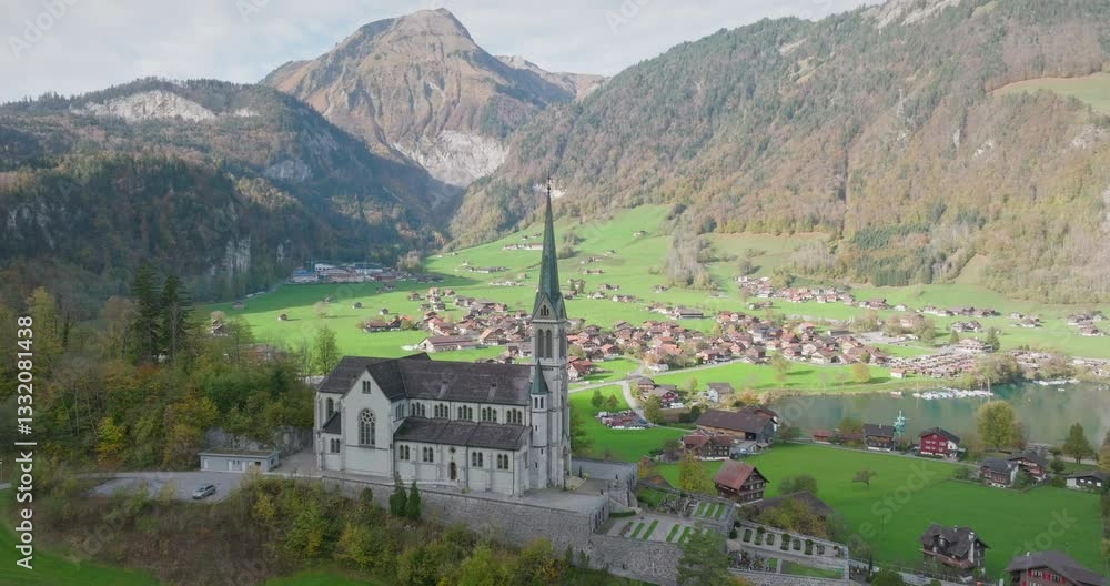 Sacred Heart of Jesus Church and Alpine views in Lungern, Switzerland ...