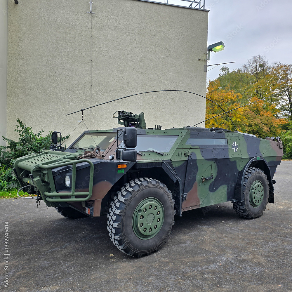 Poster Armored Military Vehicle in Camouflage Designed for Stealth and ...