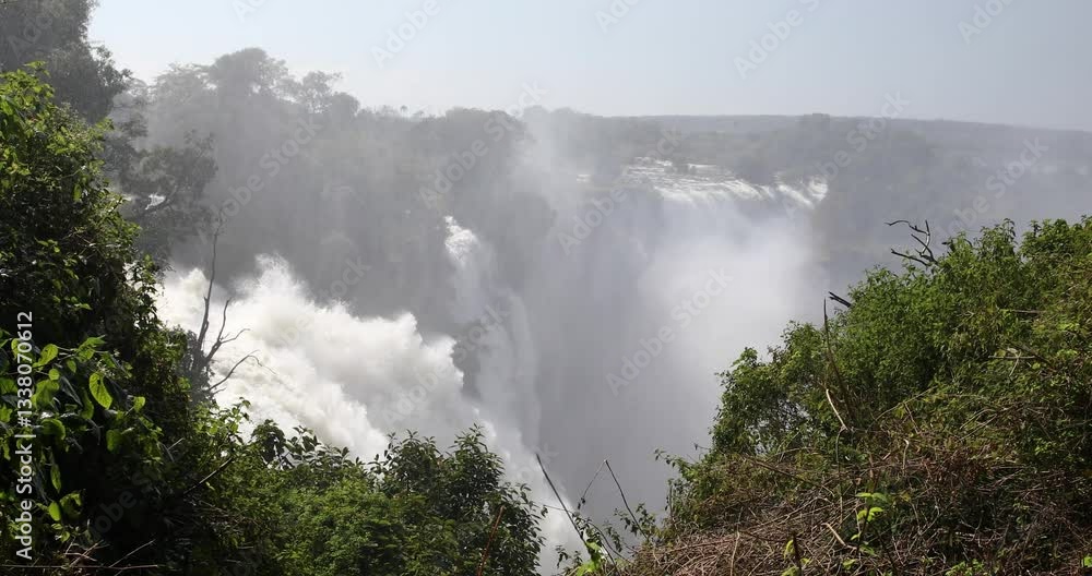 Majestic Victoria Falls in Zimbabwe, thundering waterfall creating ...