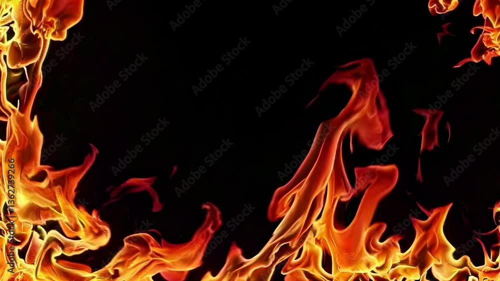 Dynamic video frame with fiery flames surrounding a black center ...