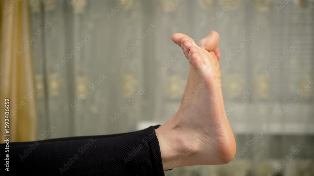 Barefoot woman moving her toes. Female without shoes wiggles toes ...