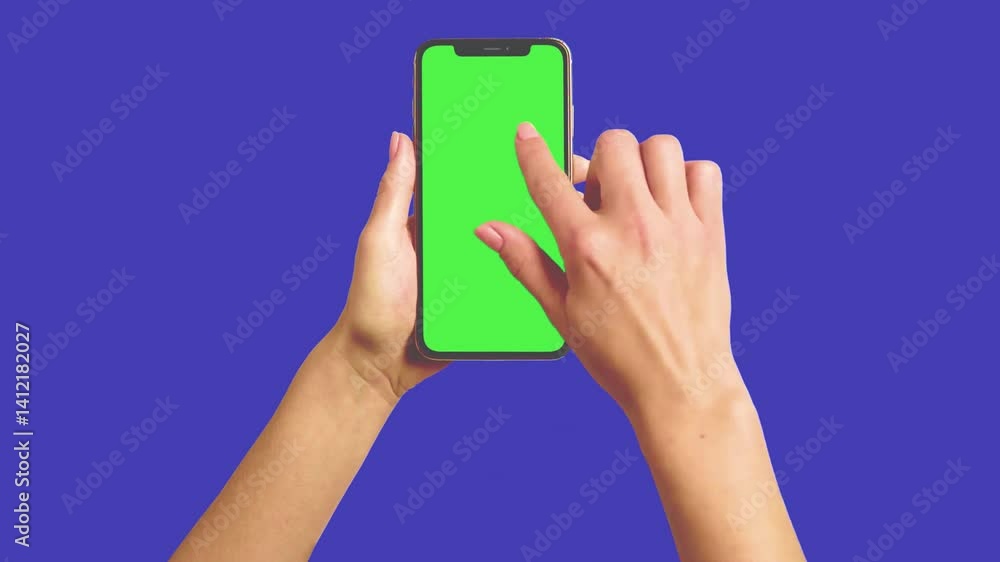 Real human hand swiping on a smartphone with a green screen, chroma key ...