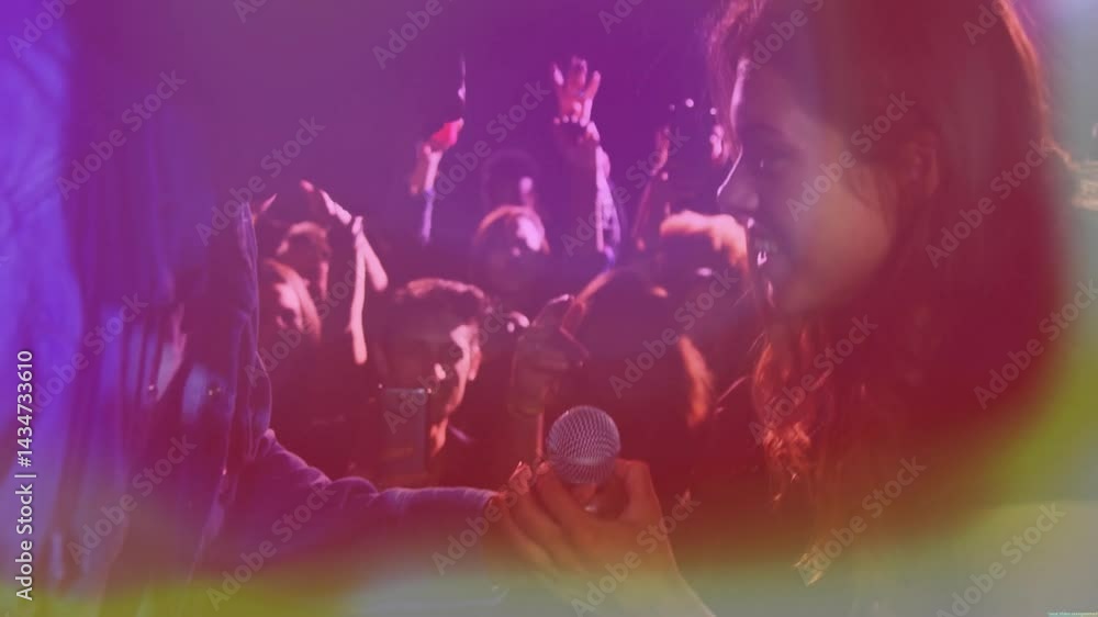 Female singer grabbing microphone on music stage, showing animated ...