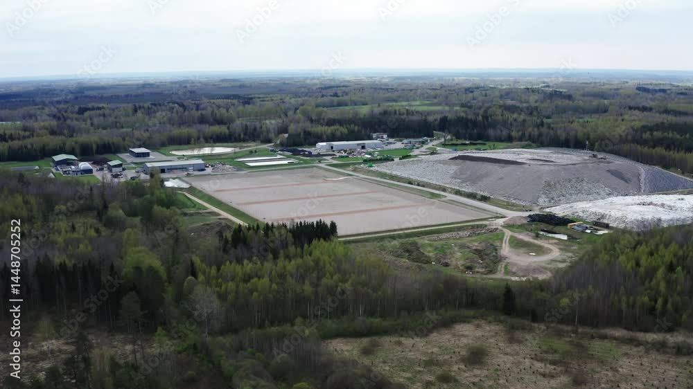 Aerial view of a large waste management and landfill facility ...