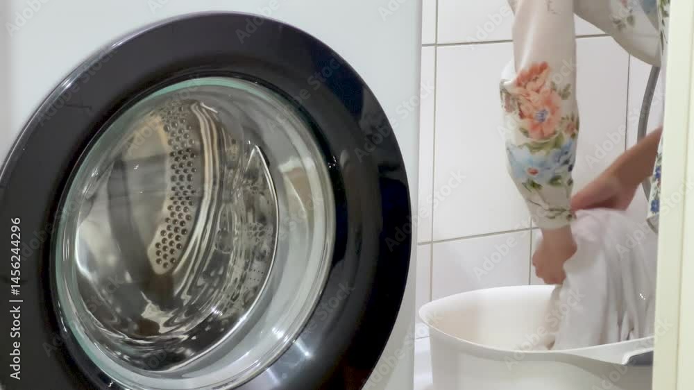 Wringing Wet White Clothes After Wash. Woman’s hands wringing wet white ...