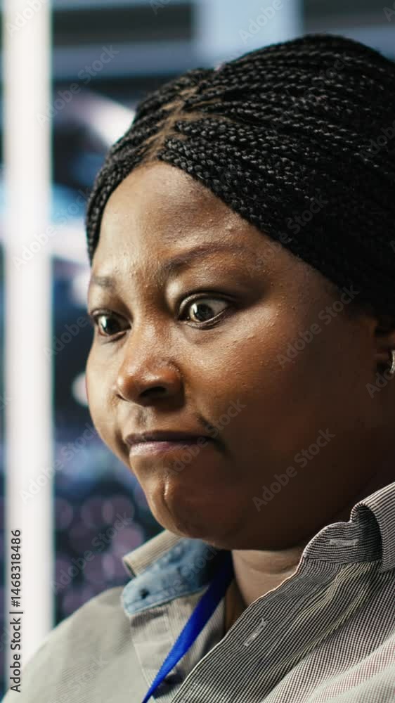 Vertical video Annoyed data center admin having trouble doing node tree programming. Irked woman ...