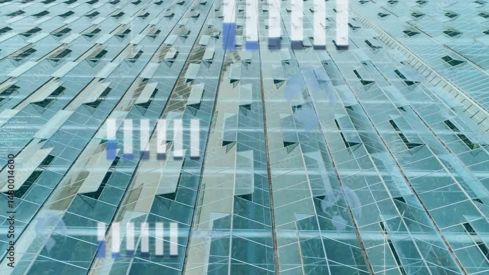 Glass building facade featuring angled windows, showing digital bar ...