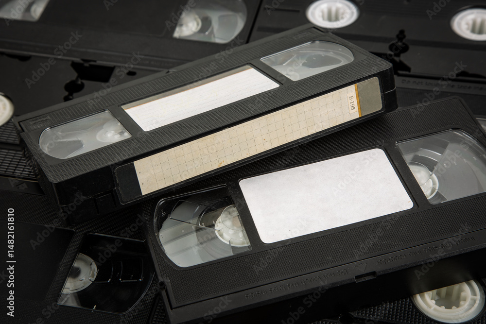 Poster Close-up view of retro VHS cassettes with blank labels – Wall ...