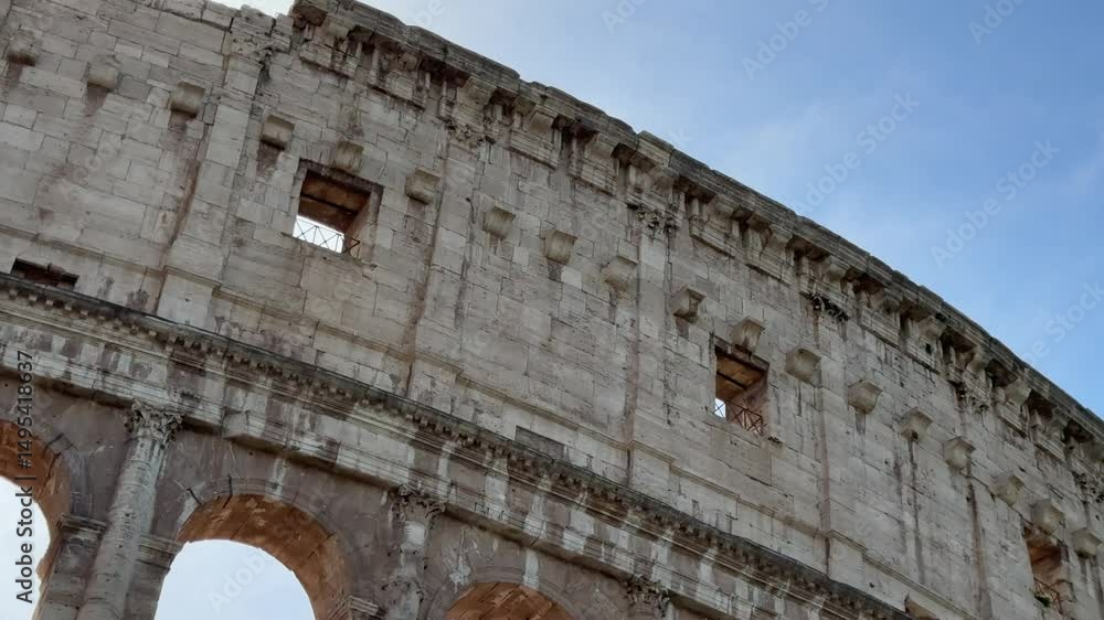The Colosseum in Rome, an iconic ancient amphitheater known for ...