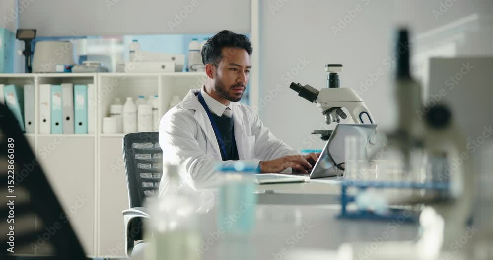 Microscope, science and laptop with man in laboratory for forensic ...