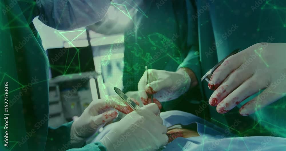 Scalpel wielding surgeon and assistant making abdominal incision for ...