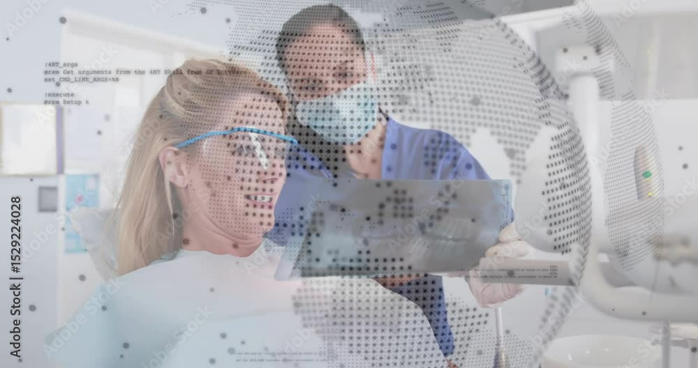 Dentist shifting tablet into patient line of sight and tapping X-ray to ...