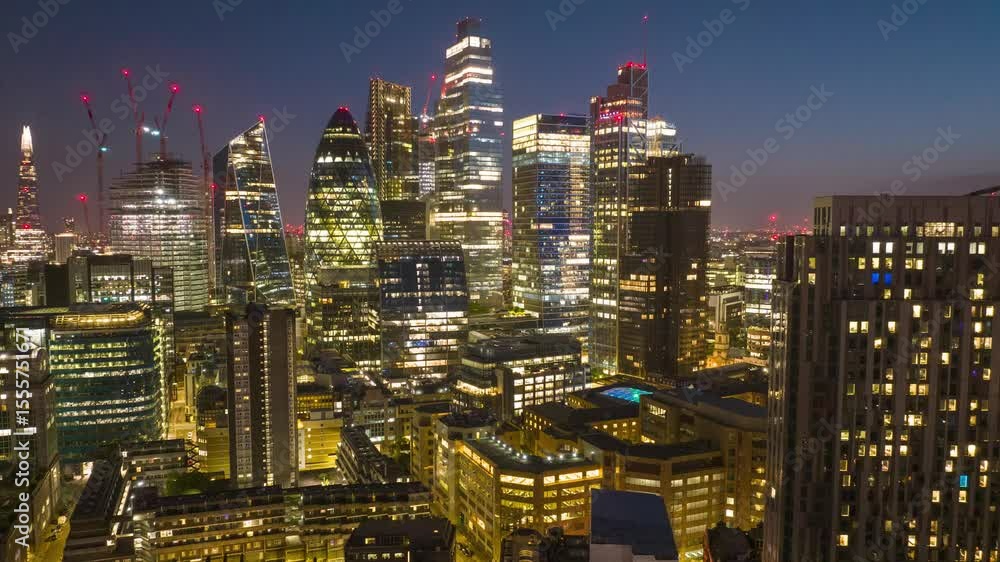 Night city hyper lapse shot, group of modern tall downtown skyscrapers ...