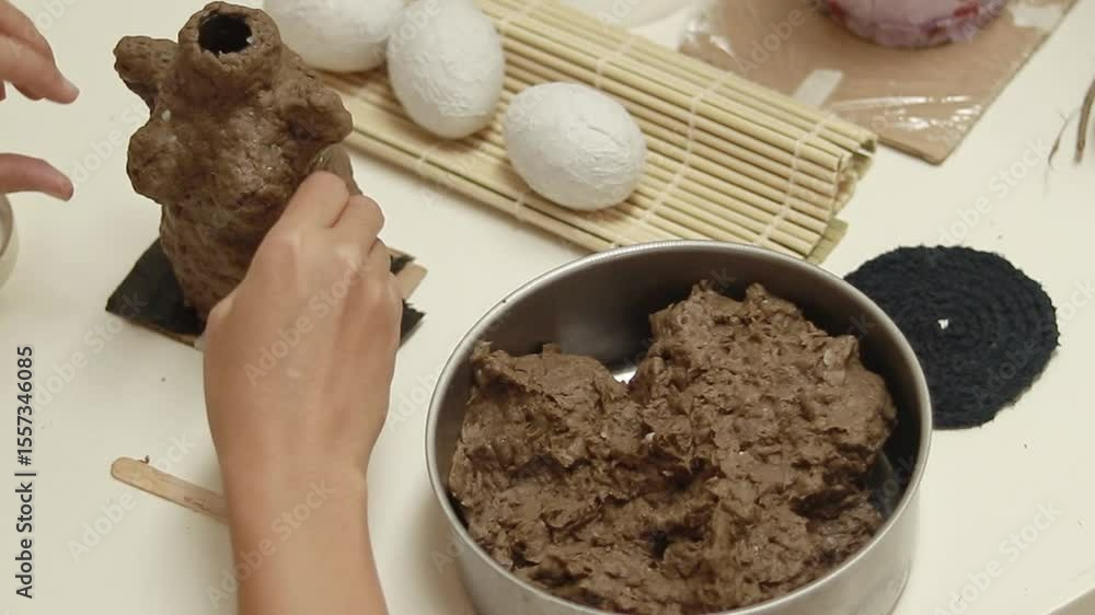 Creating a sculpture of the female body by hand using paper air dry ...