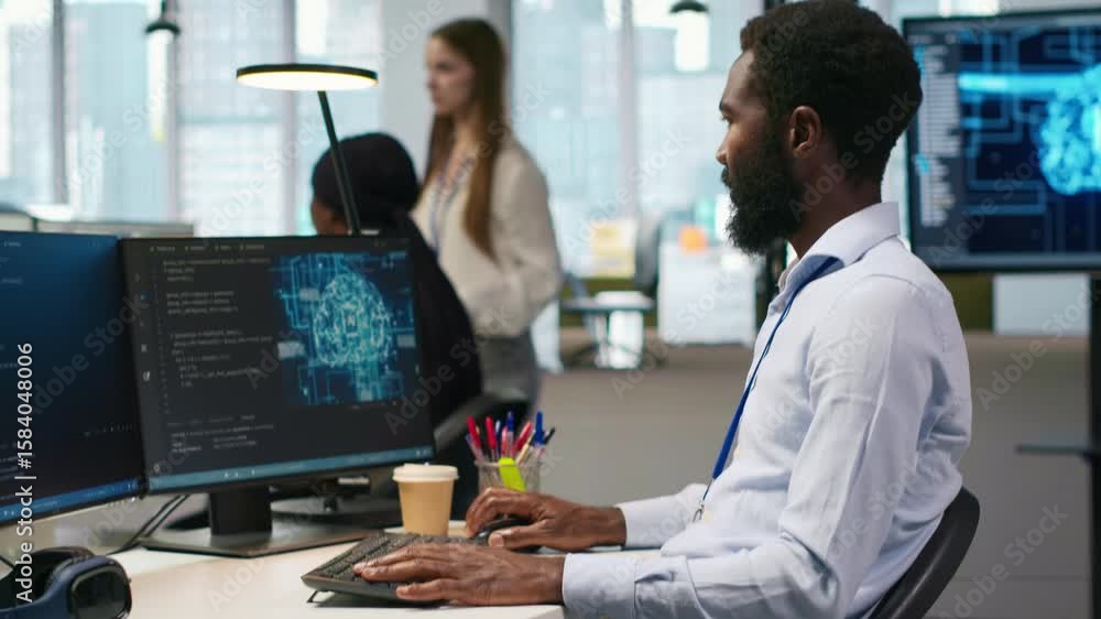 Software developer writing code on PC, developing deep learning APIs. IT professional using ...