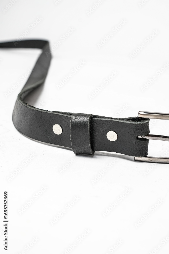 Black leather belt closeup shoot Stock Photo | Adobe Stock