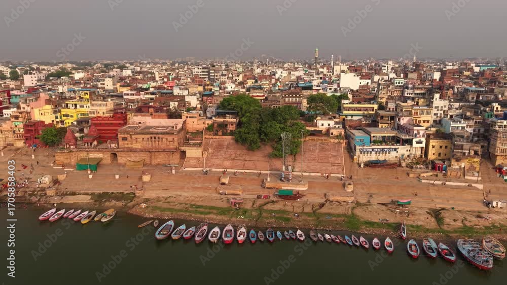 Stockvideon Varanasi, India: Aerial view of famous ancient holy city on ...