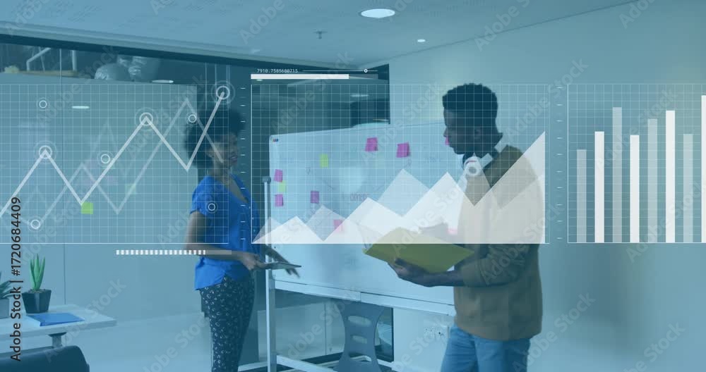 woman adding notes and man reviewing file initiating animated charts ...