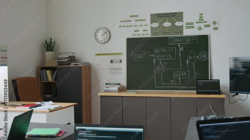 No people shot of interior of computer science classroom with laptops ...