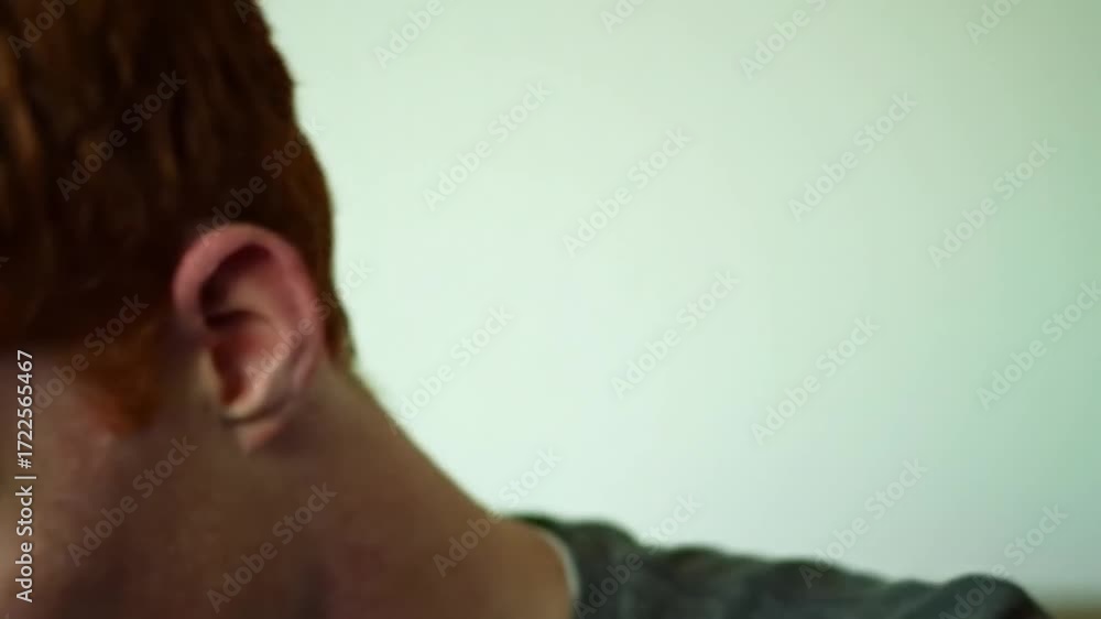 Intimate detail of a person's ear and neck, a close-up capturing skin ...