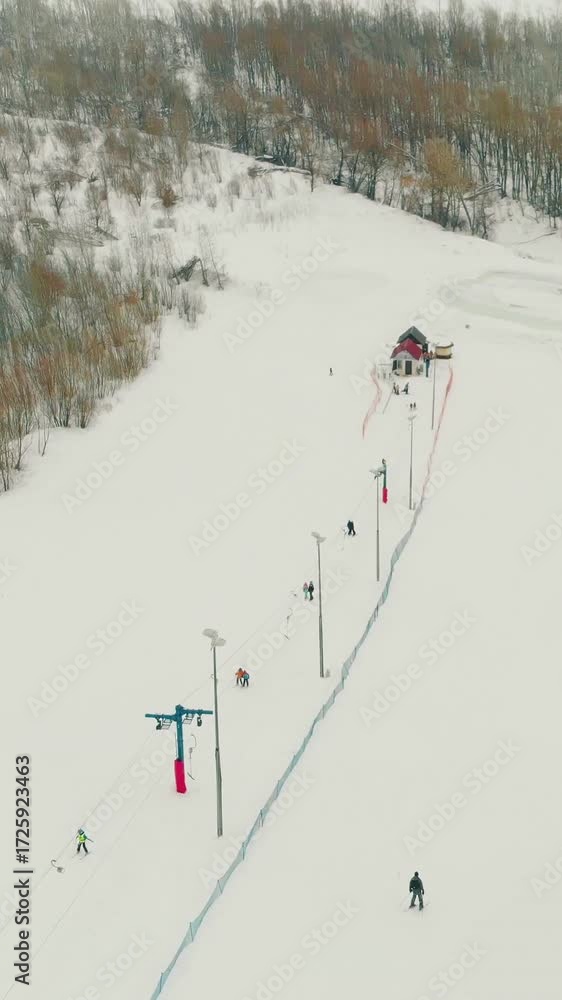 pictorial landscape with ski trail and surface lift poma on mountain ...