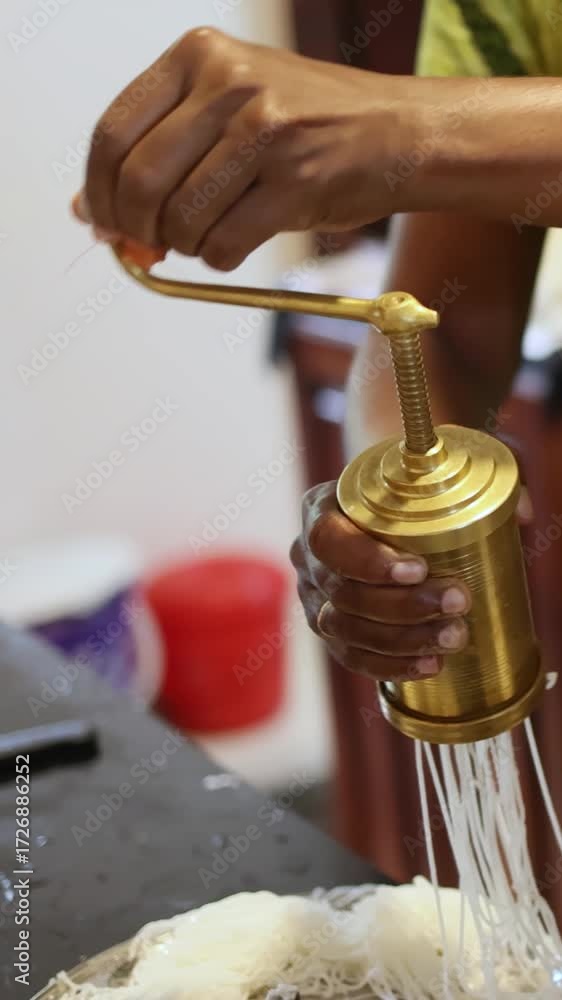 Cooking process of traditional South Indian Idiyappam string hoppers ...