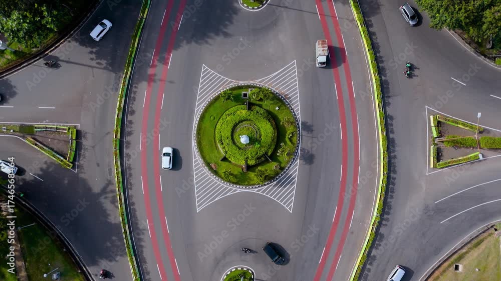Jakarta, Indonesia - 07 October 2025: Aerial view of a roundabout with ...