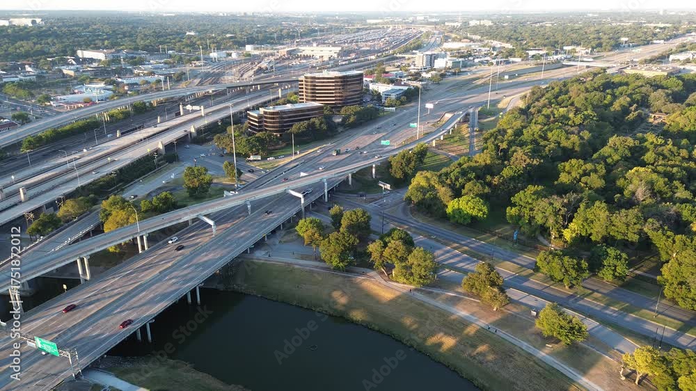Lush urban park and tree canopy border the Trinity River, stacked ...