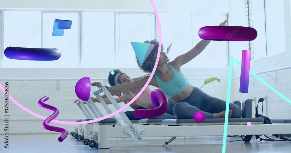 Instructor initiating lateral bend and guiding students in reformer ...