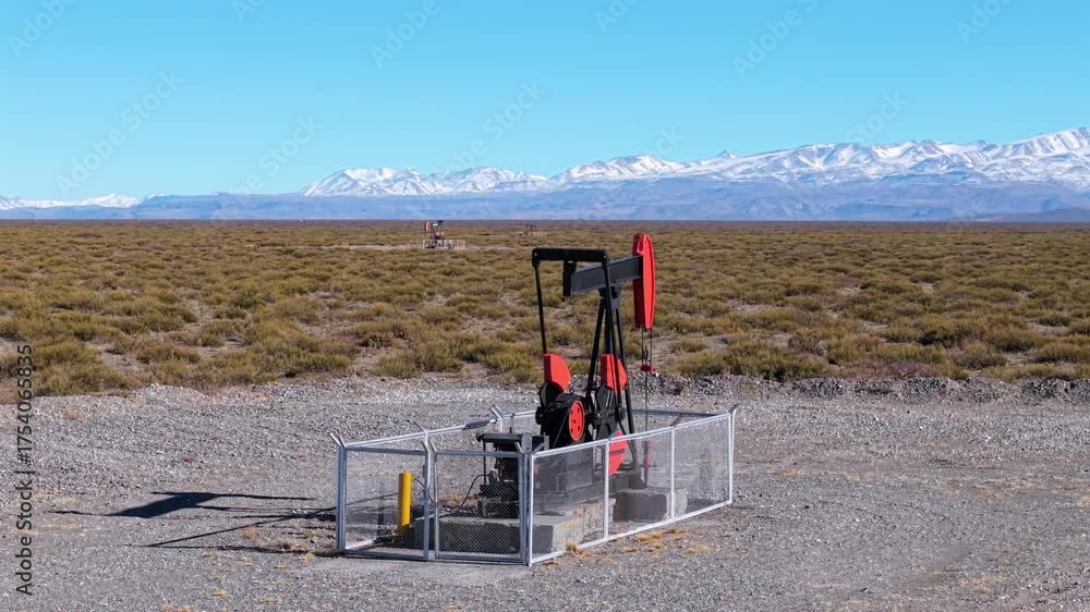 Oil pumpjack in Vaca Muerta field Patagonia Argentina with Andes ...