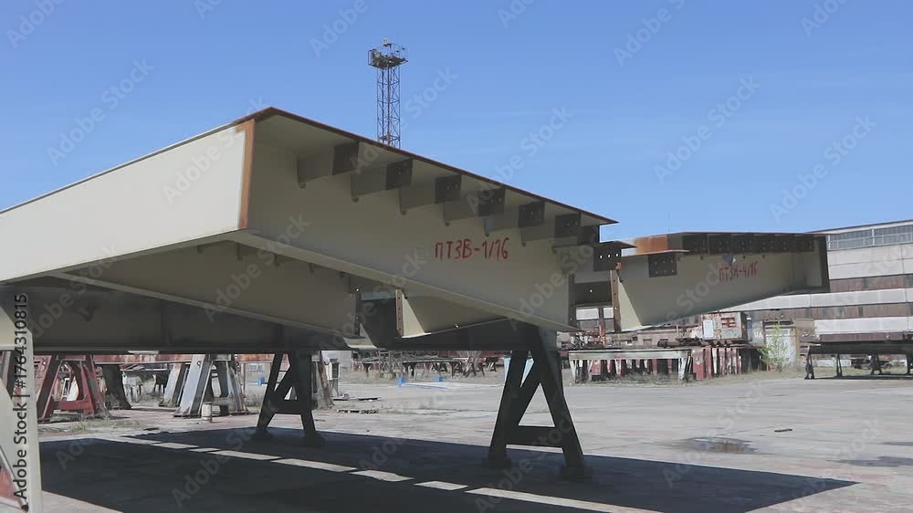Part of a large metal structure or modular steel box bridge in a ...