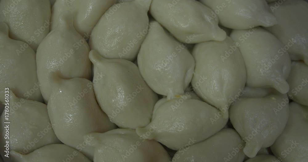 Yomari, a traditional Newari sweet made from rice flour and molasses ...