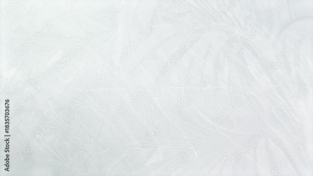 Rotating ice themed winter motion background with patterns of swirling ...