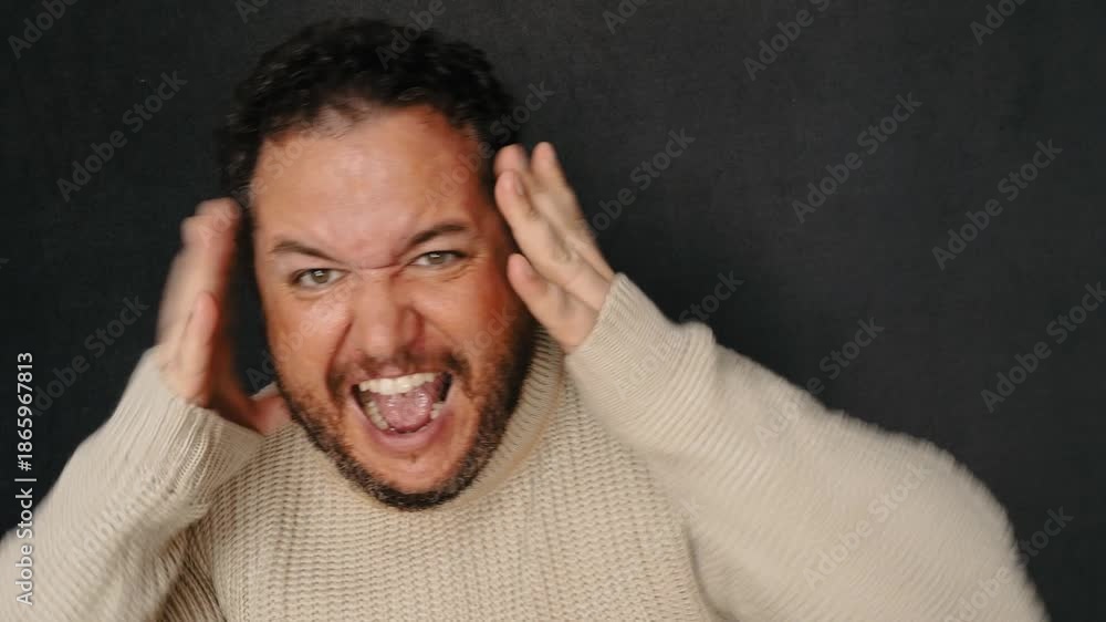 Bad news. The angry man is irritated and swearing. Stock ビデオ | Adobe Stock