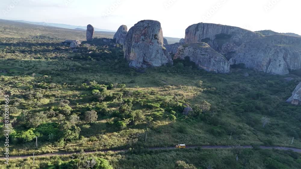 Cinematic flyover of the rugged volcanic topography at Pedras Negras, a ...