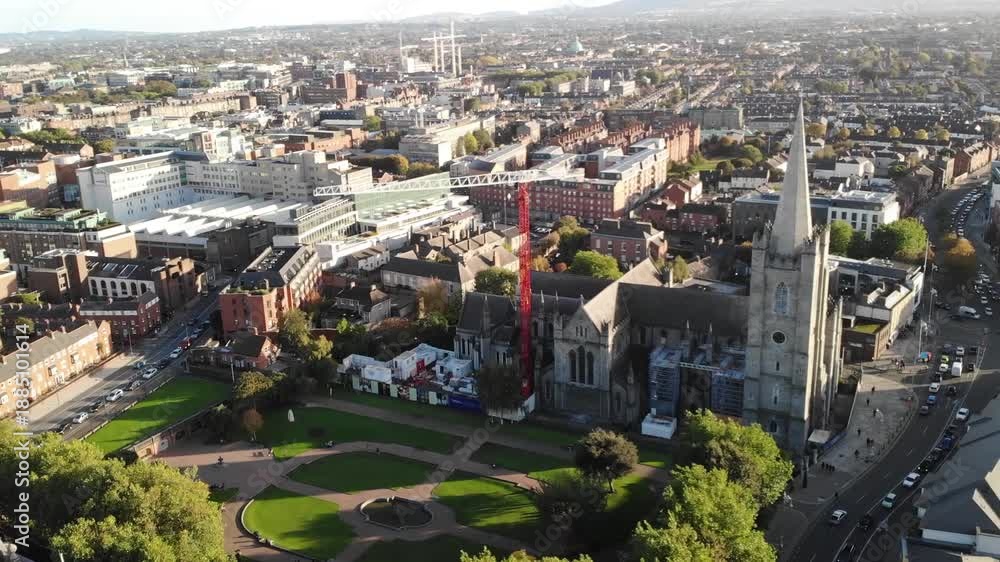 Iconic St Patricks Cathedral with park and Dublin drone cityscape with ...