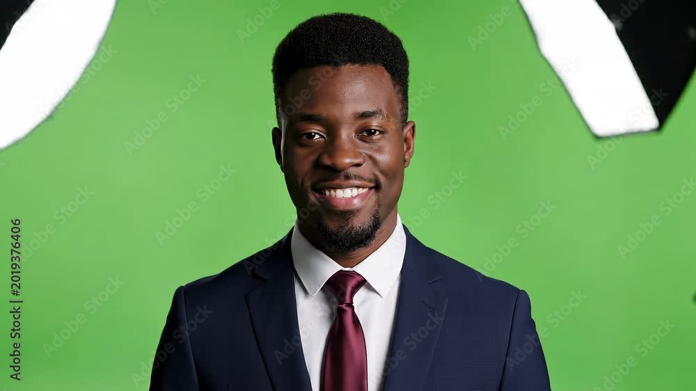Smiling young African American businessman, professional portrait ...