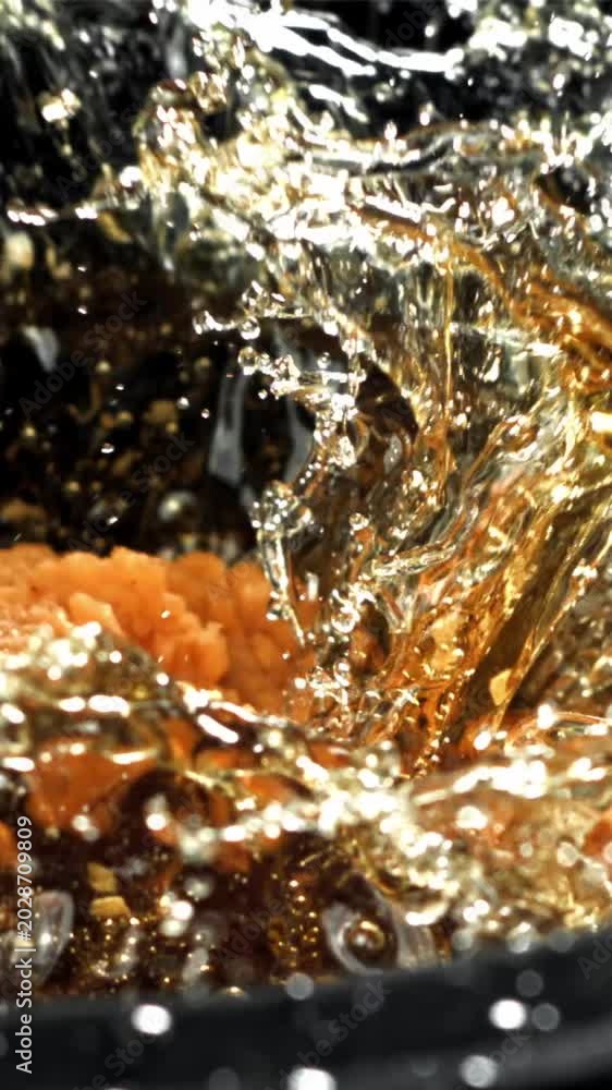 Nuggets with splash oil. Filmed is slow motion 1000 fps. High quality ...