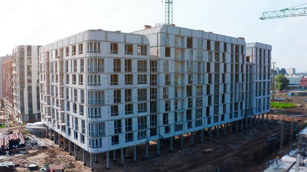Construction site update on residential development with tower cranes ...